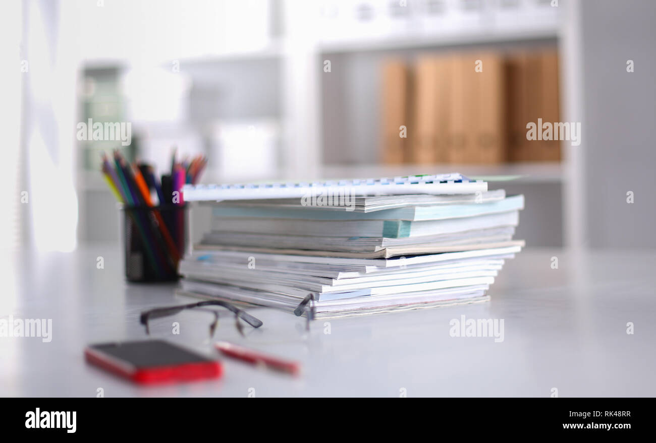 Workspace desktop, documents on the office table Stock Photo - Alamy
