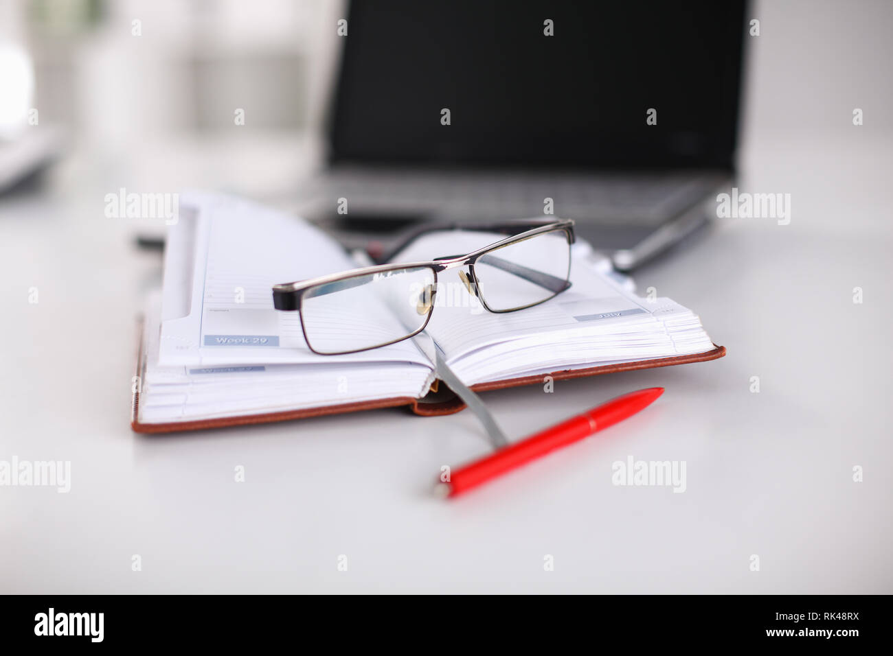 Workspace desktop, documents on the office table Stock Photo - Alamy