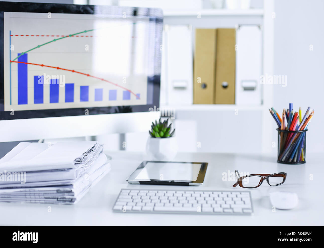 Workspace desktop, documents on the office table Stock Photo - Alamy