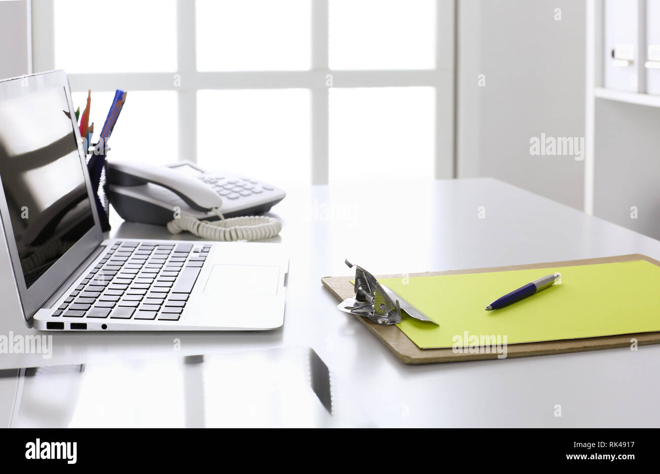 Workspace desktop, documents on the office table Stock Photo - Alamy