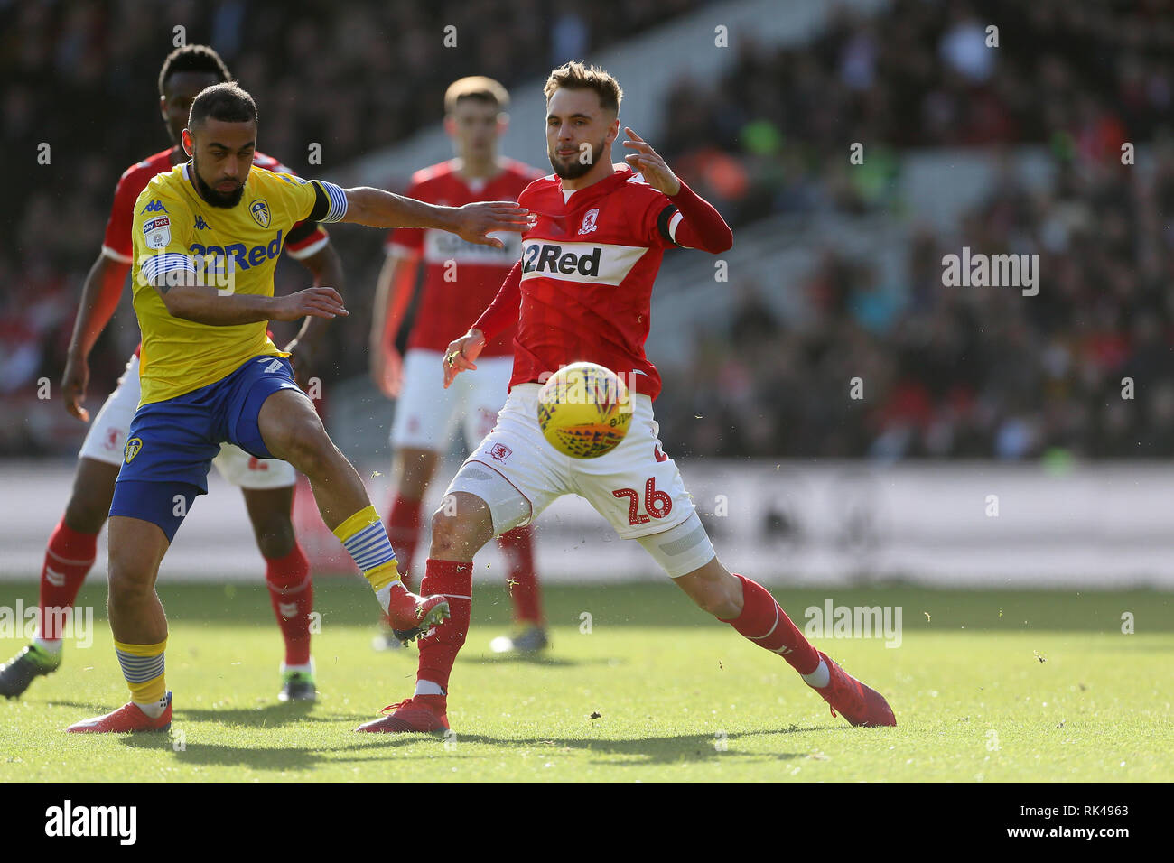Leeds United's Kemar Roofe (left) and Middlesbrough's Lewis Wing during ...