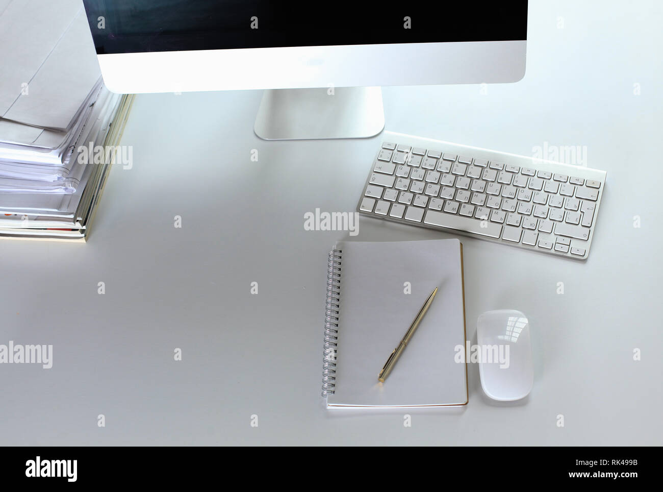 Workspace desktop, documents on the office table Stock Photo - Alamy