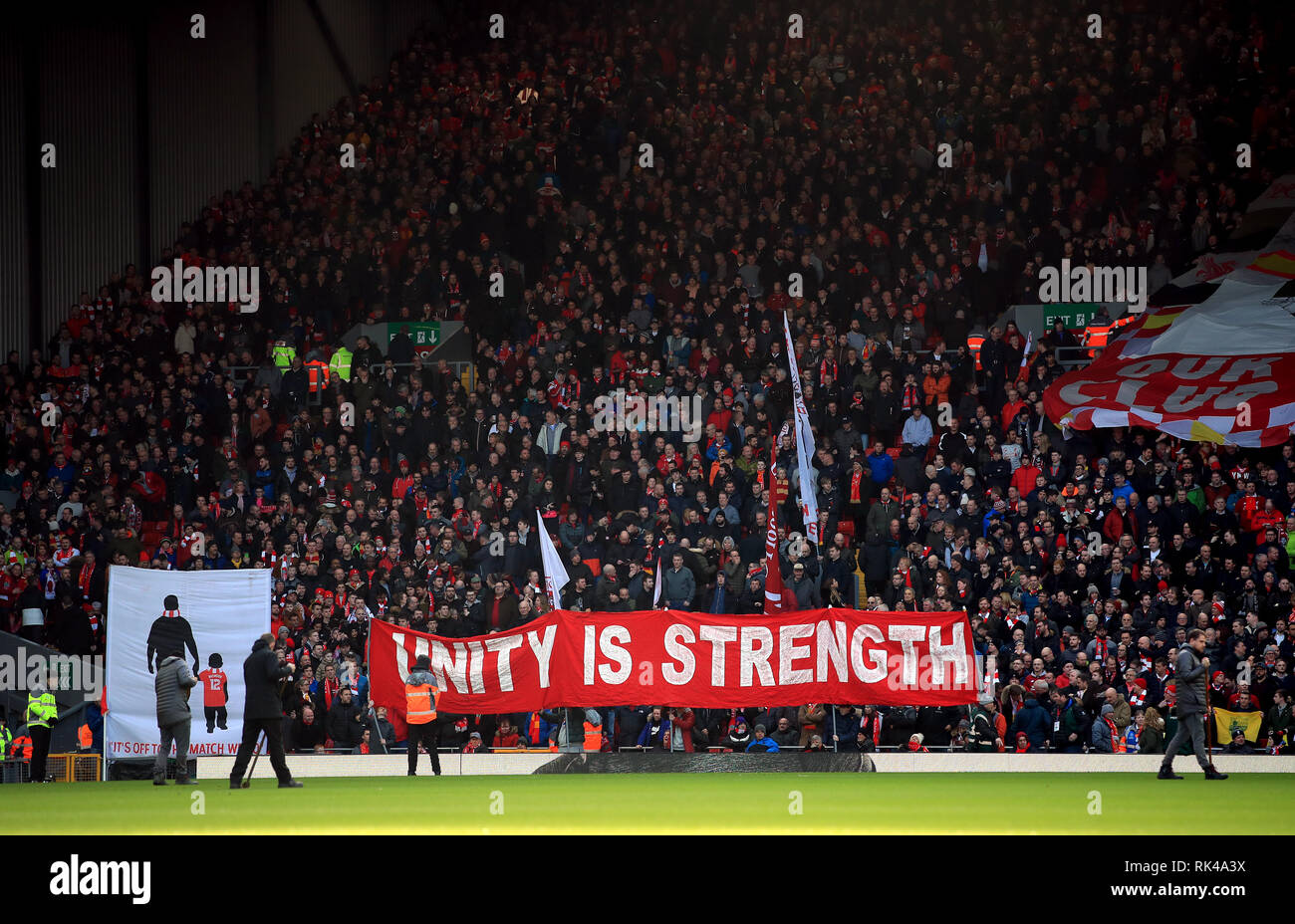 Liverpool fans in the stands with a Unity is Strength banner during the ...