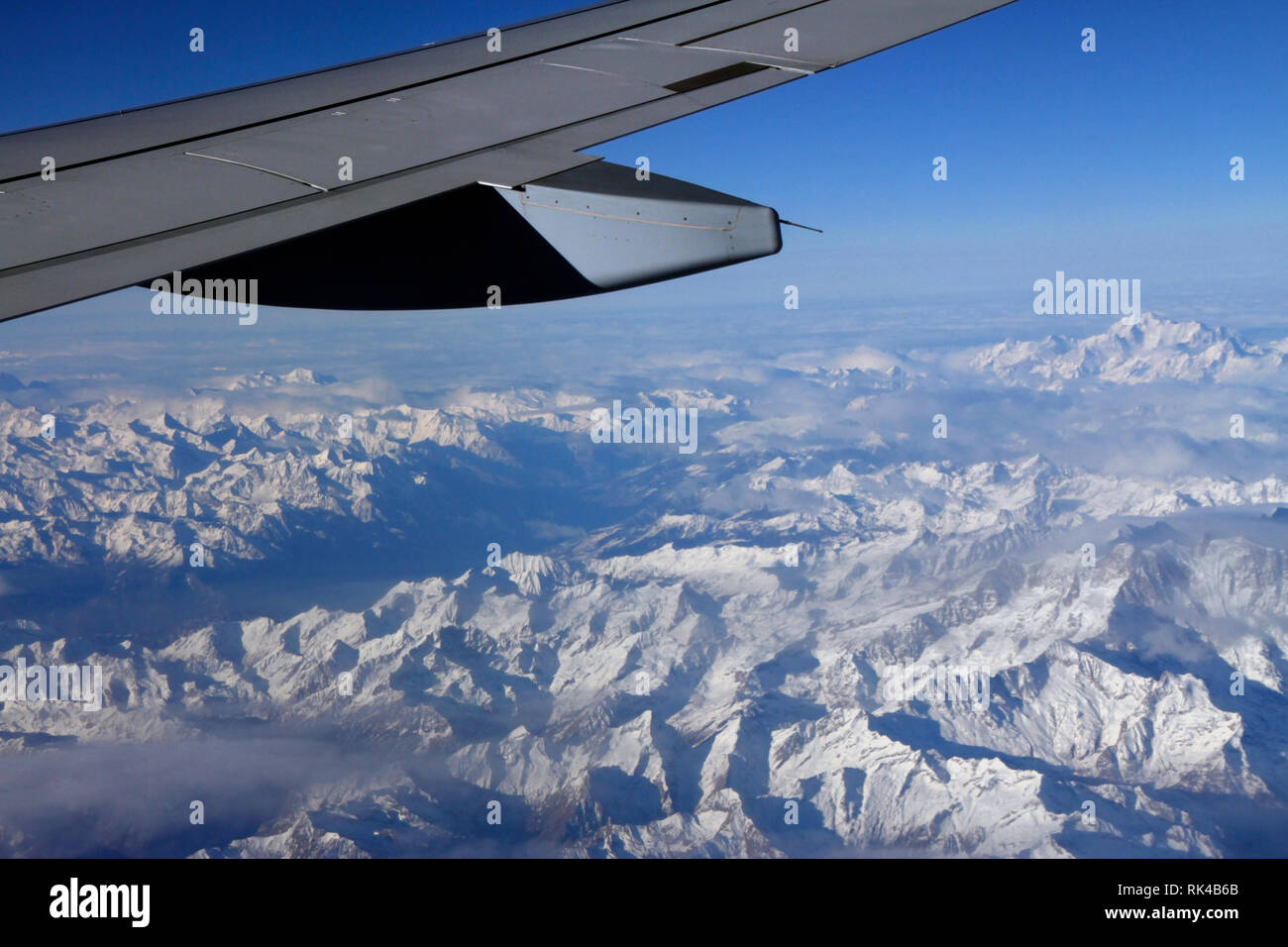 View from airplane window alps hi-res stock photography and images - Alamy