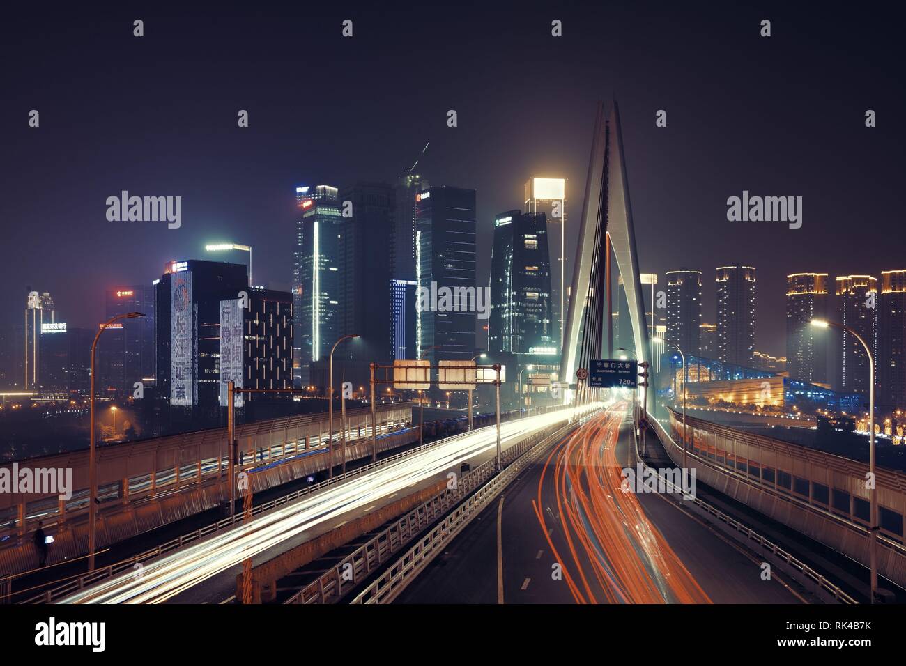 Bridge and light trail at night in Chongqing, China Stock Photo - Alamy