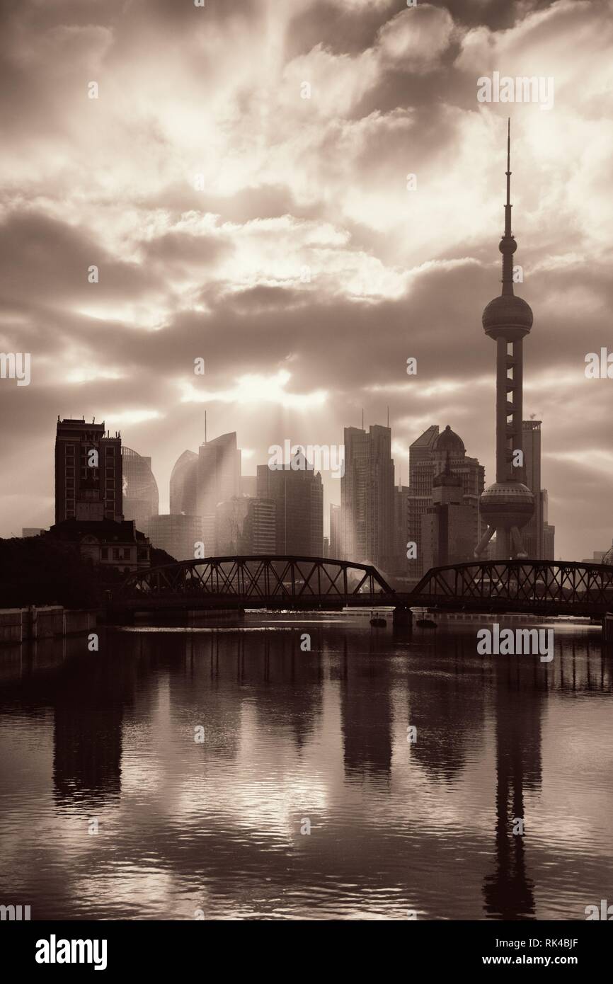 Shanghai morning with sunny sky and water reflections in China Stock ...