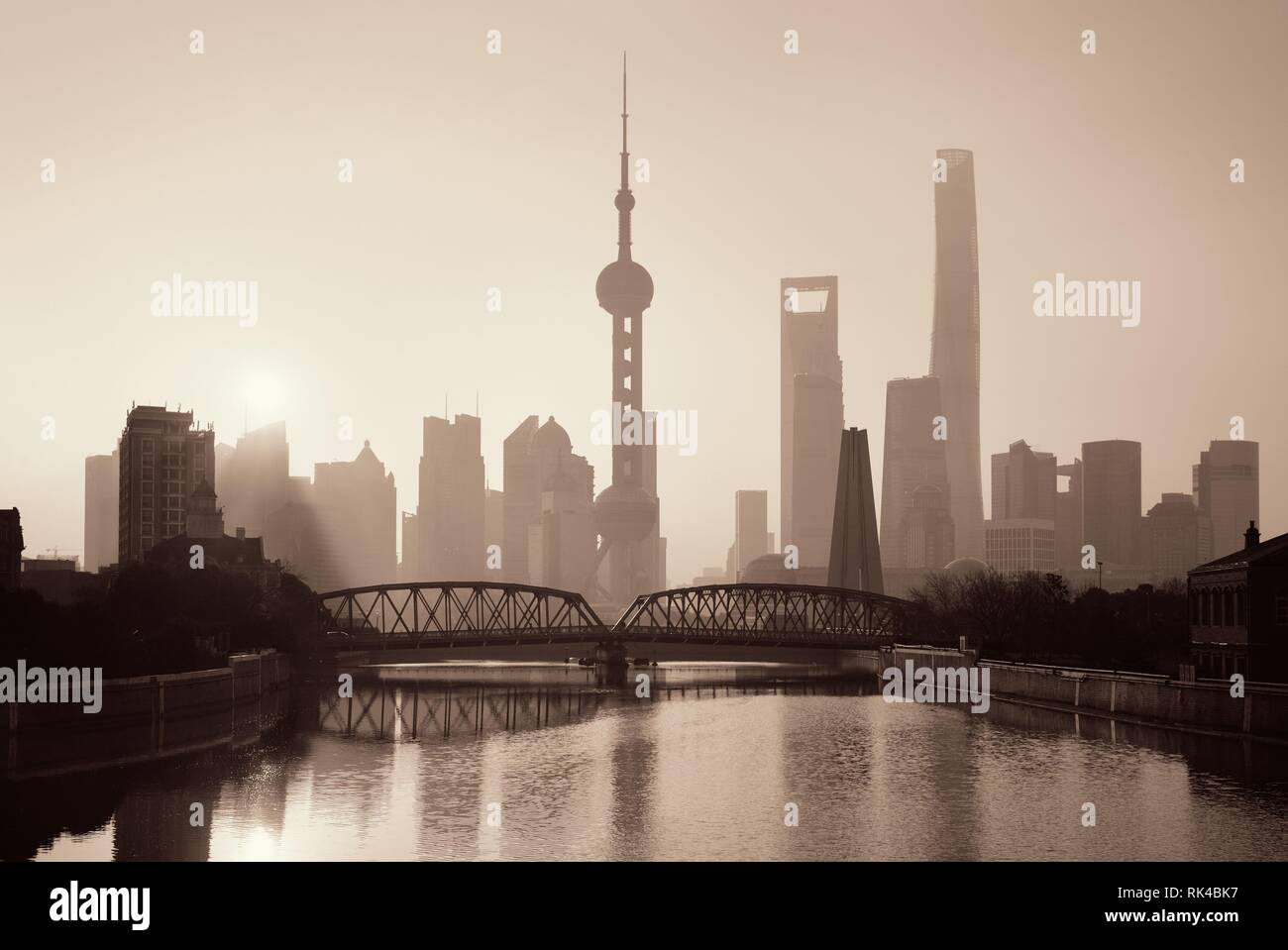 Shanghai morning with sunny sky and water reflections in China Stock ...