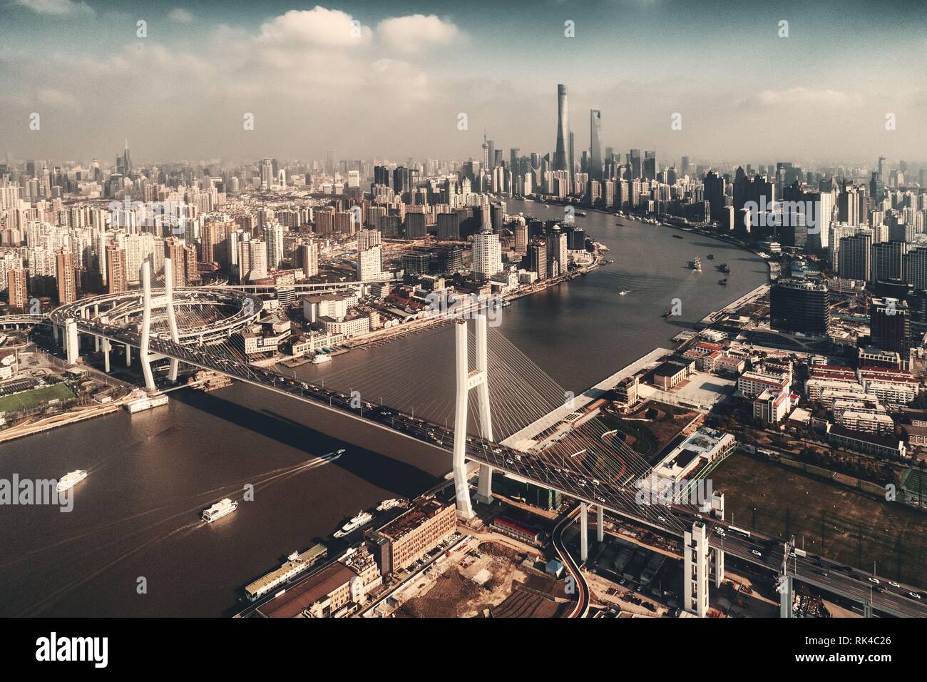 Shanghai Nanpu Bridge over Huangpu River with busy traffic in China ...