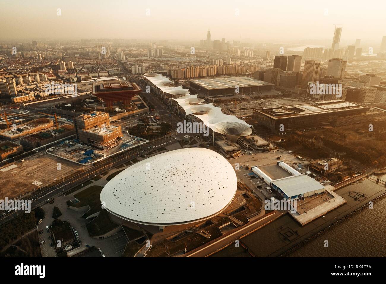 Shanghai Expo Park aerial view from above with city skyline and ...