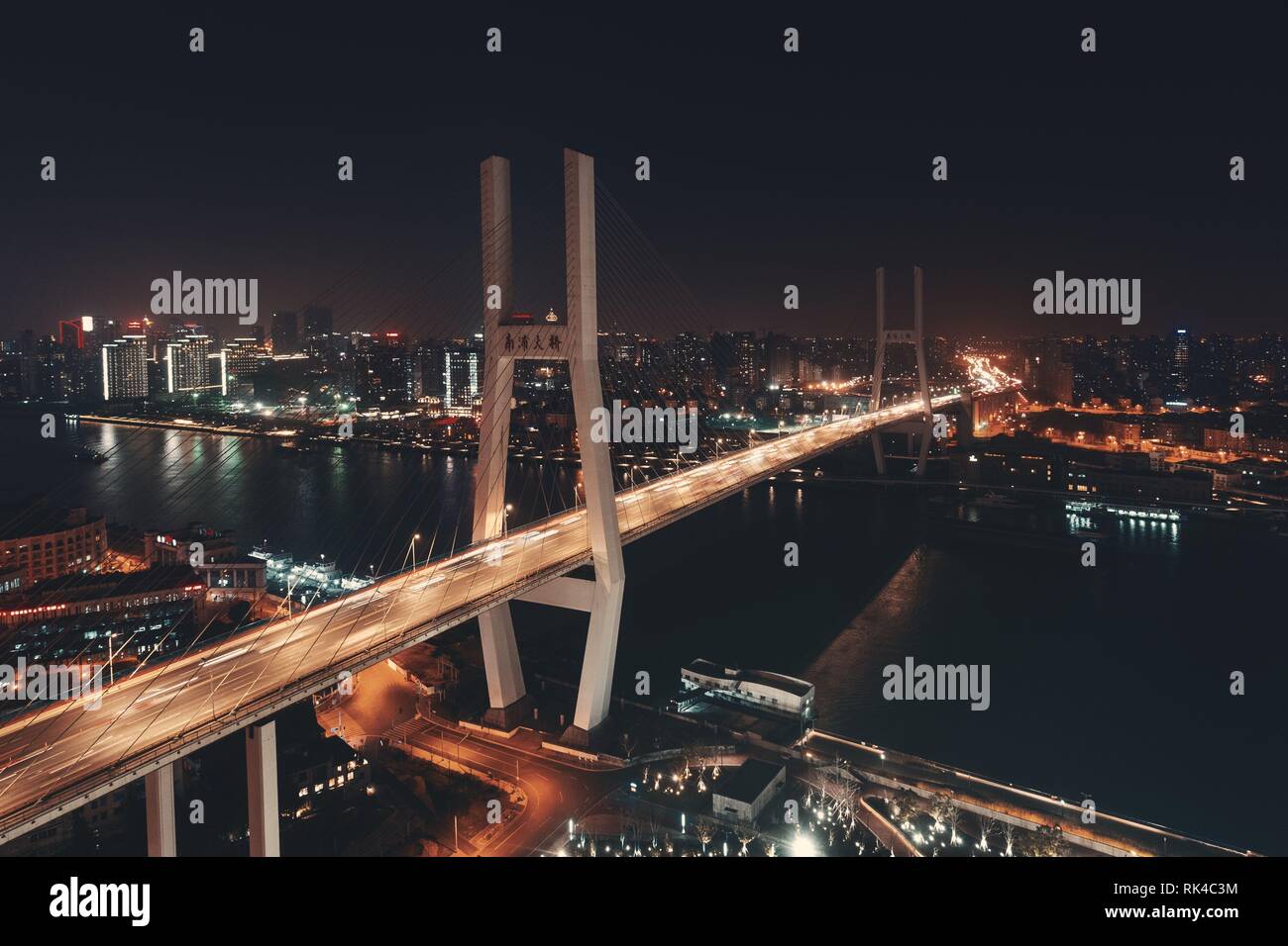 Shanghai Nanpu Bridge over Huangpu River with busy traffic in China Stock Photo - Alamy