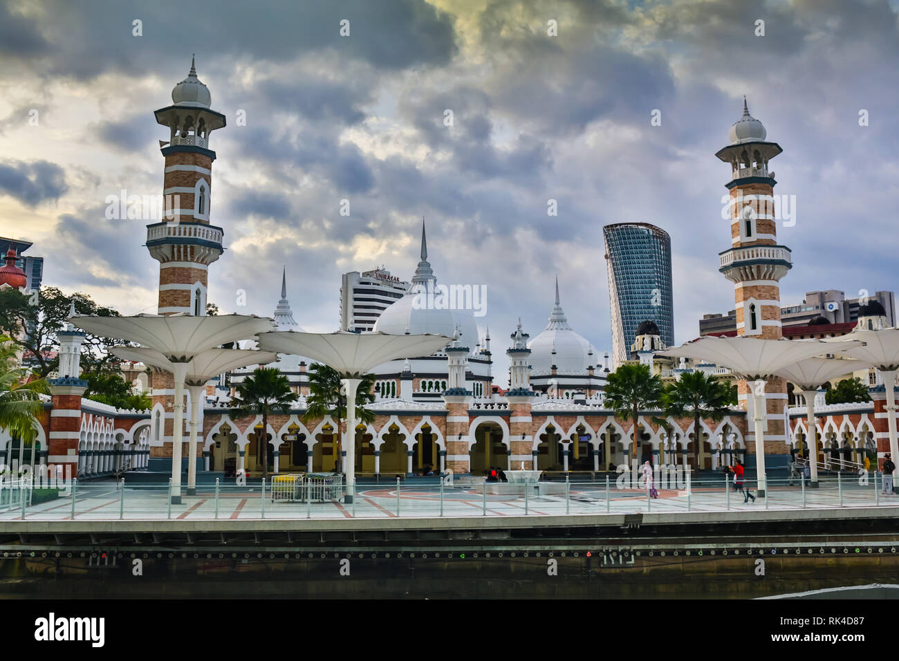 Historic mosque, Masjid Jamek at Kuala Lumpur, Malaysia at sunset Stock ...