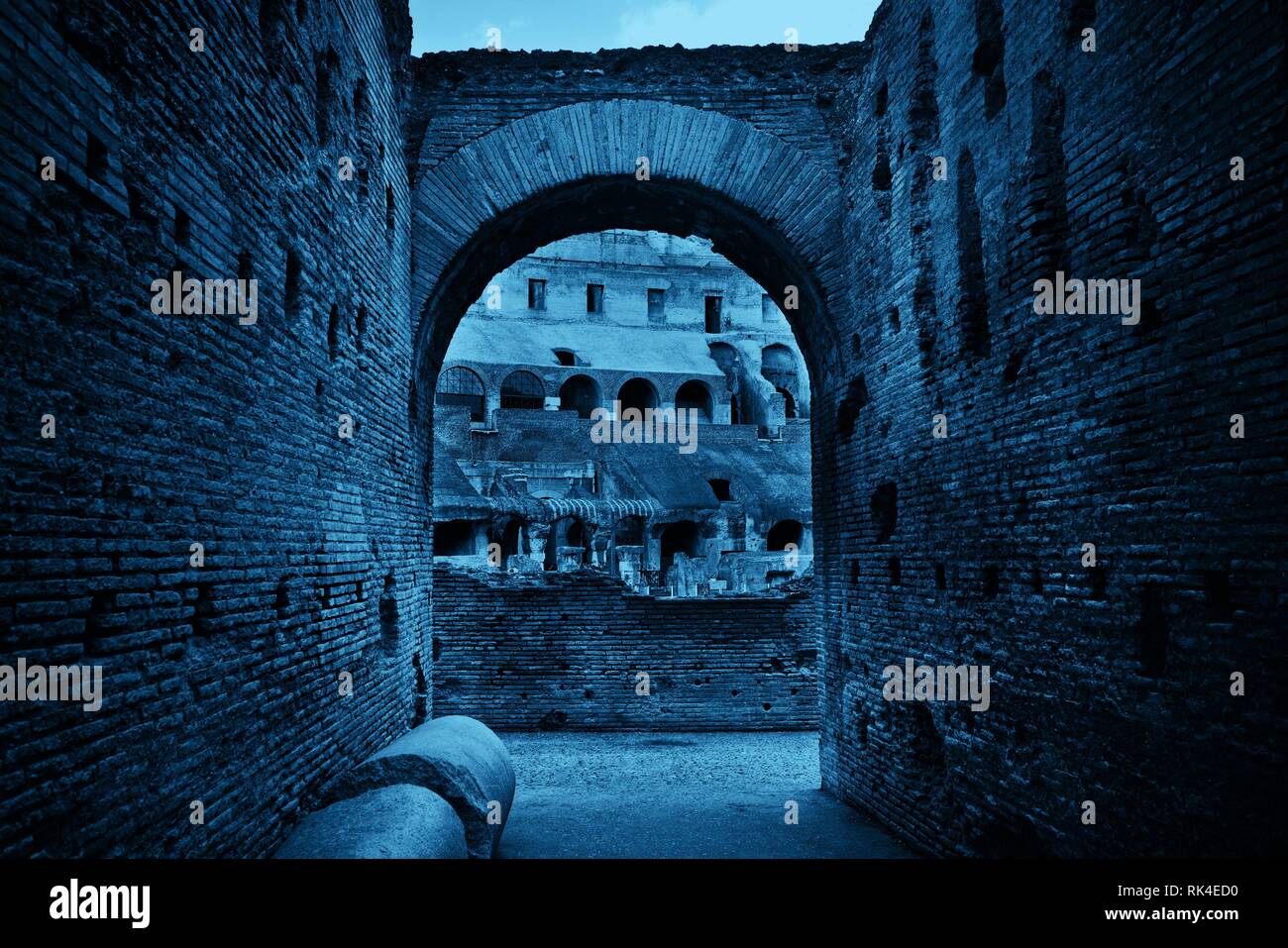 Archway in Colosseum, the world known landmark and the symbol of Rome ...