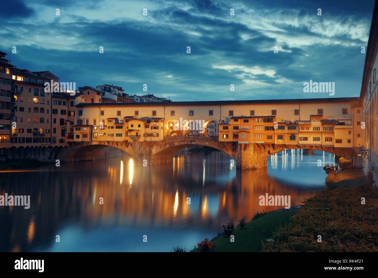 Ponte Vecchio over Arno River at night in Florence Italy Stock Photo ...