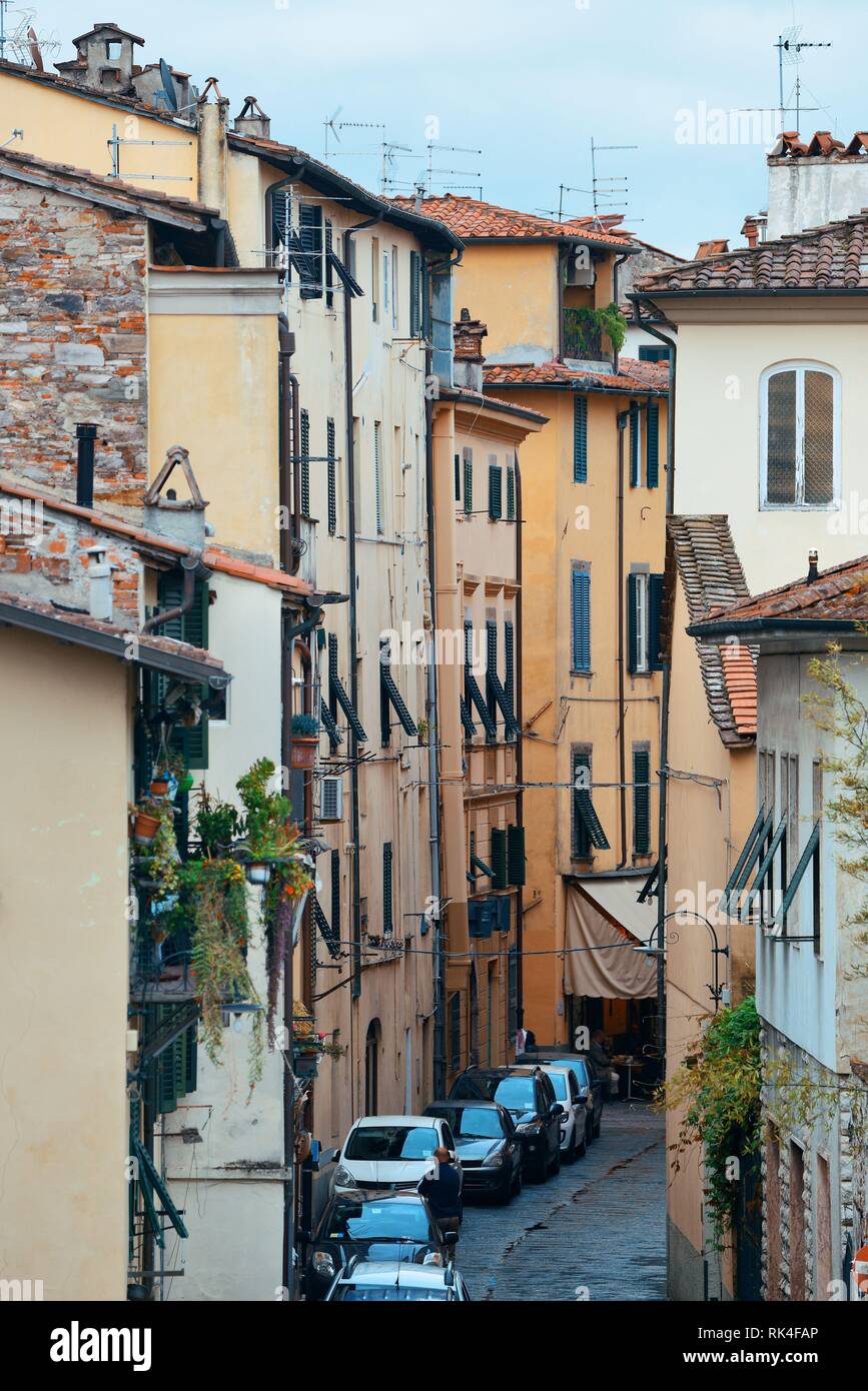 Lucca street view with cars in Italy Stock Photo - Alamy