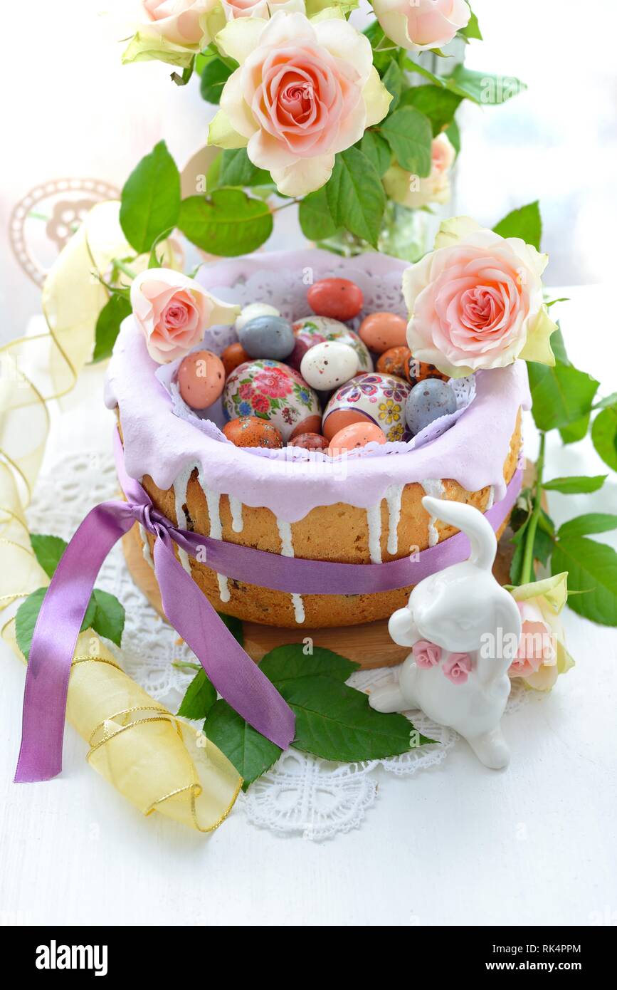 Easter cake with glace icing and easter eggs Stock Photo - Alamy