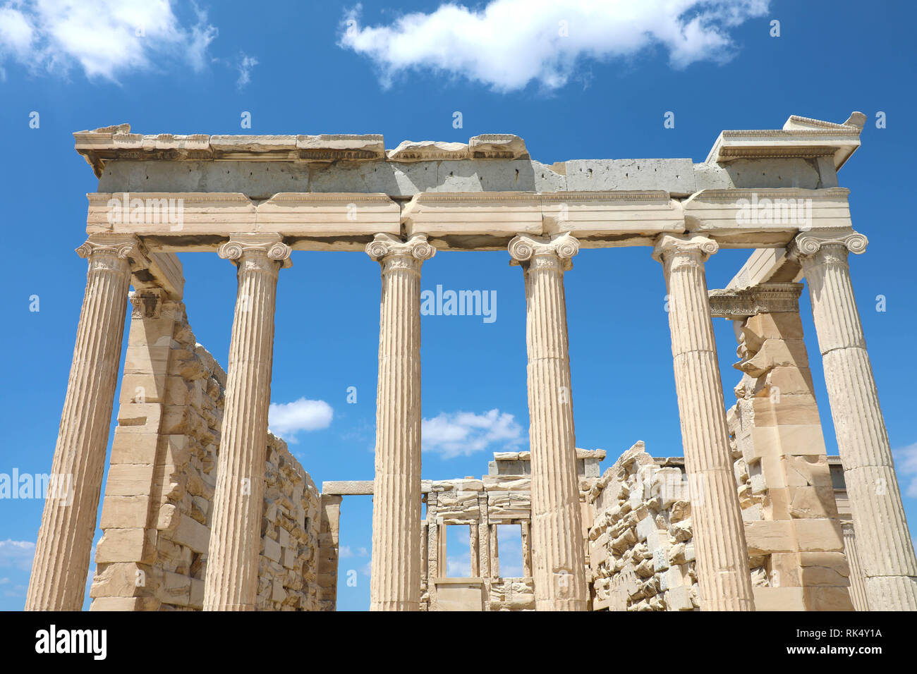 Greek temple ruins on the Acropolis in a summer day in Athens, Greece ...