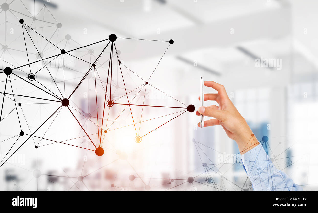 Business and technology concept with networking grid and man using ...