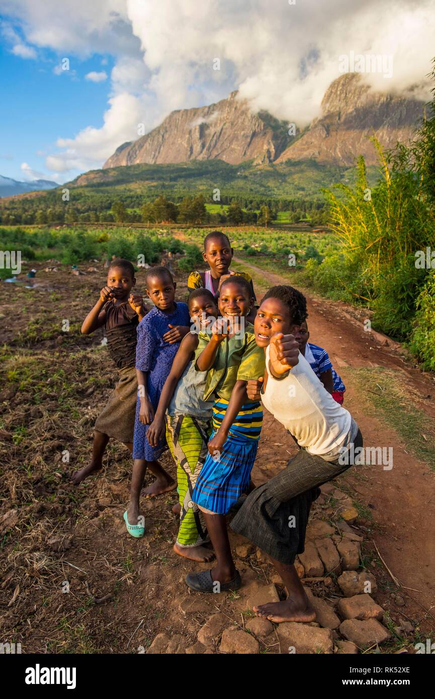 Children having fun posing before Mount Mulanje, Malawi, Africa Stock ...