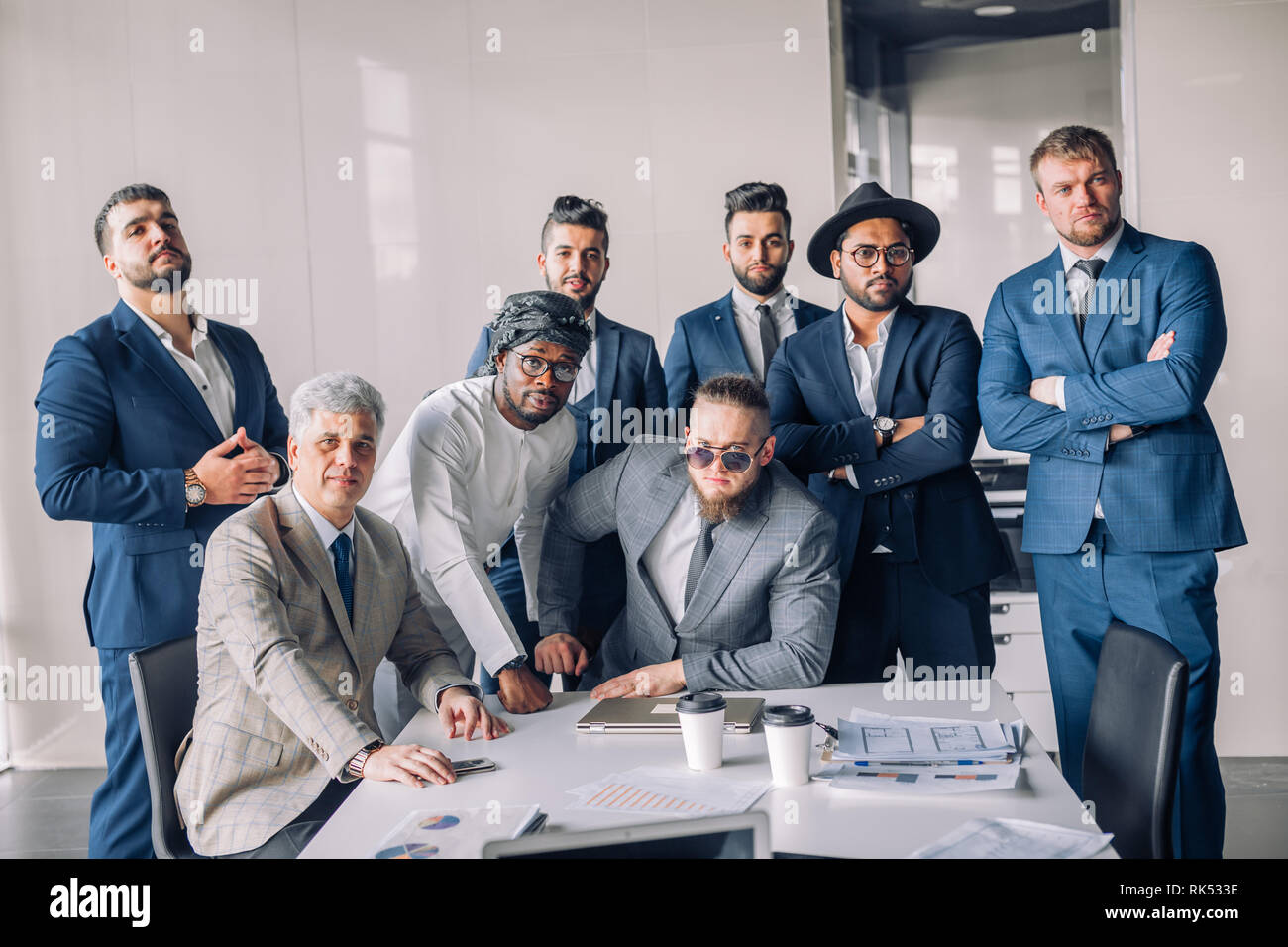 Portrait of ambitious successful business team, consisting of the men ...