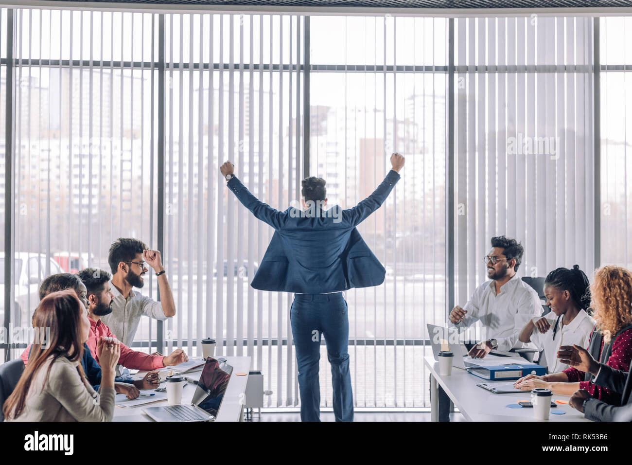 business, success, gesture and people concept - Backside of jubilant ...