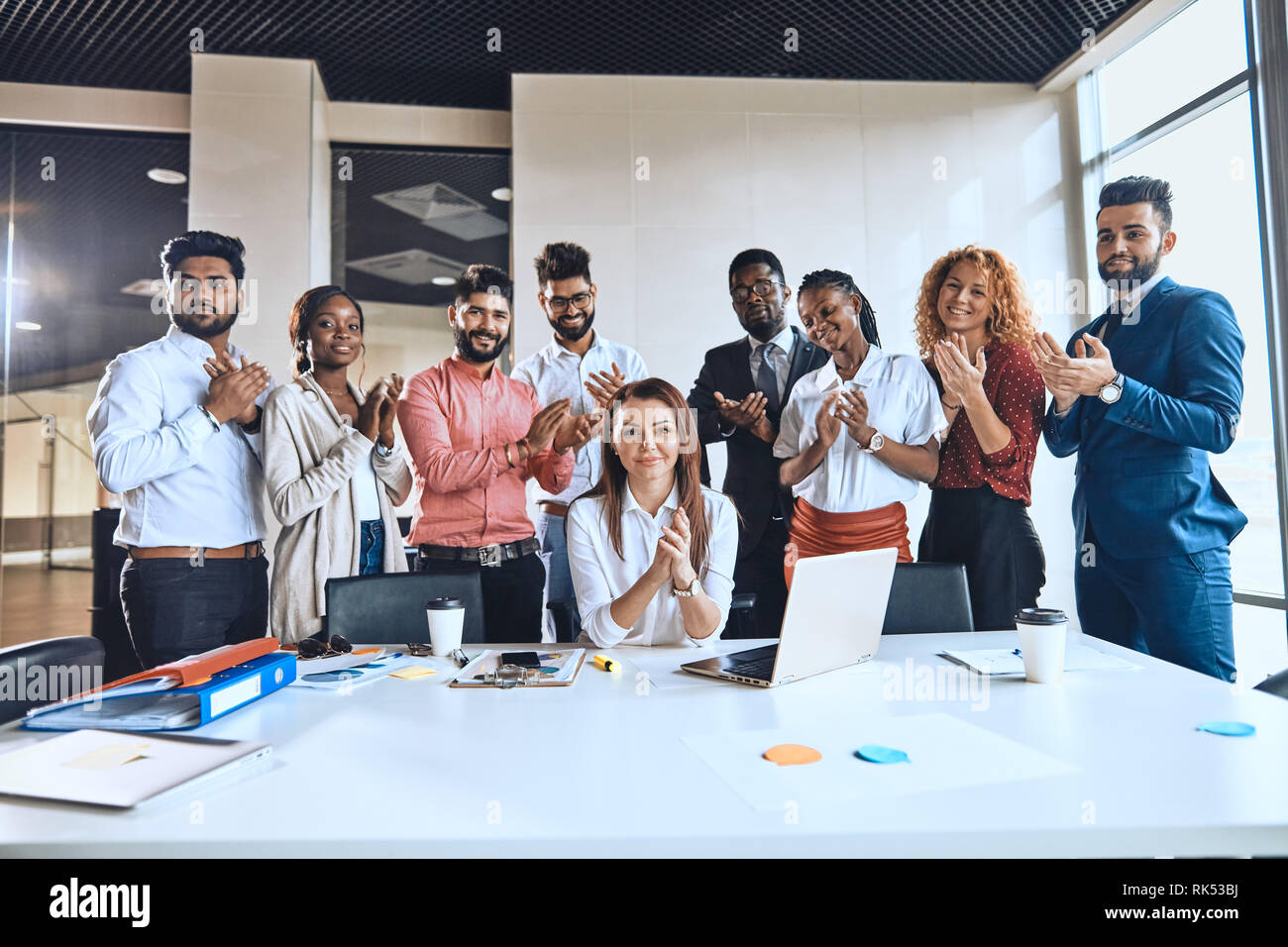 successful team work.successful team work. young office workers are ...