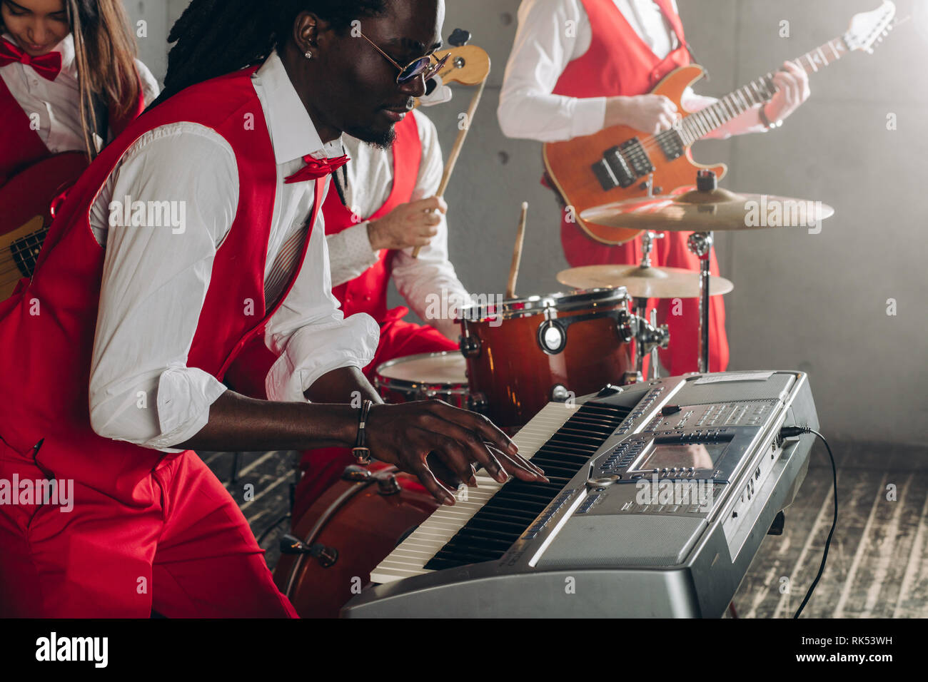 young ambitious musicians taking part at international concert. side ...