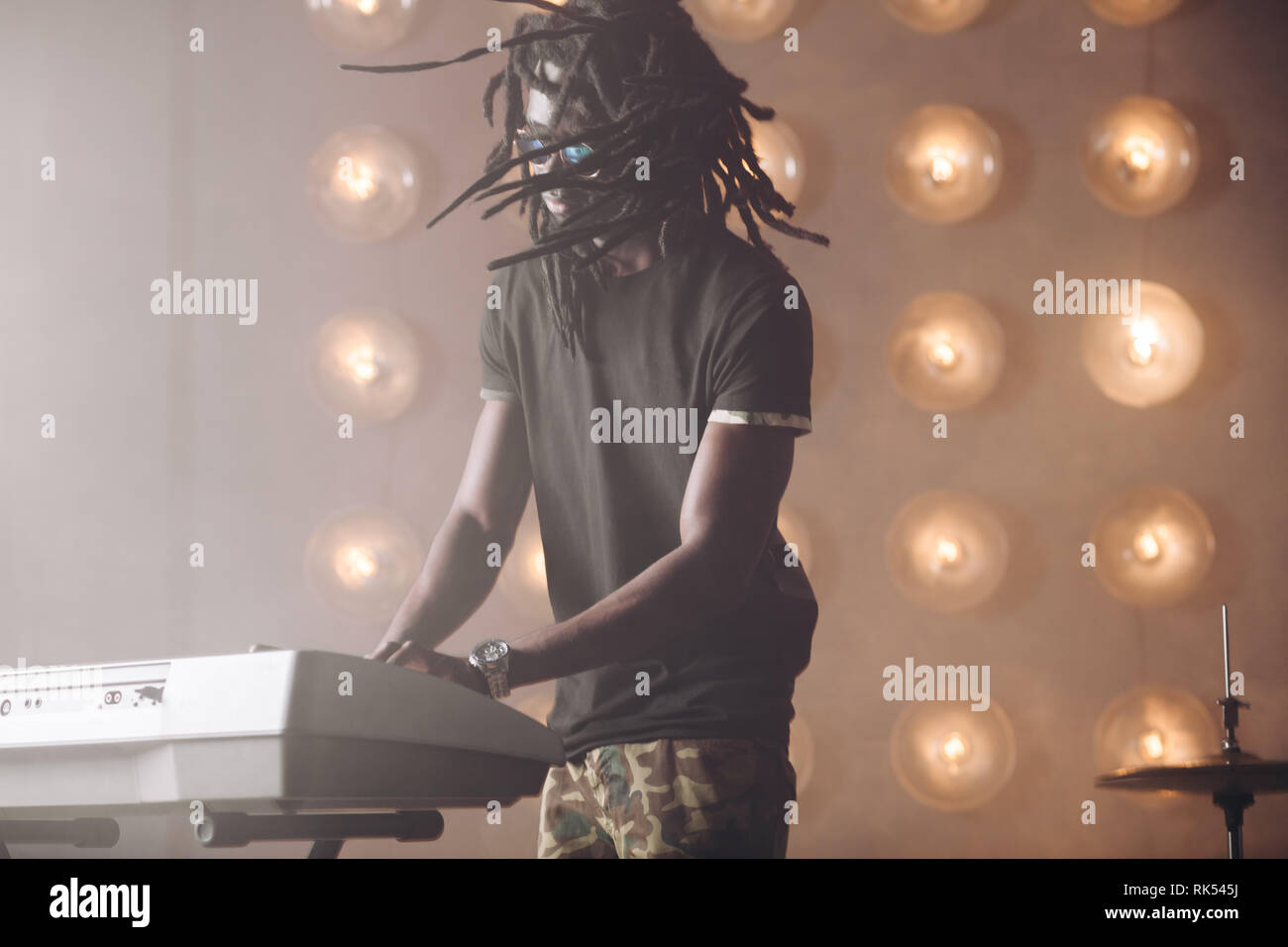 man dedicates his life to pop music. close up photo. guy digging the ...