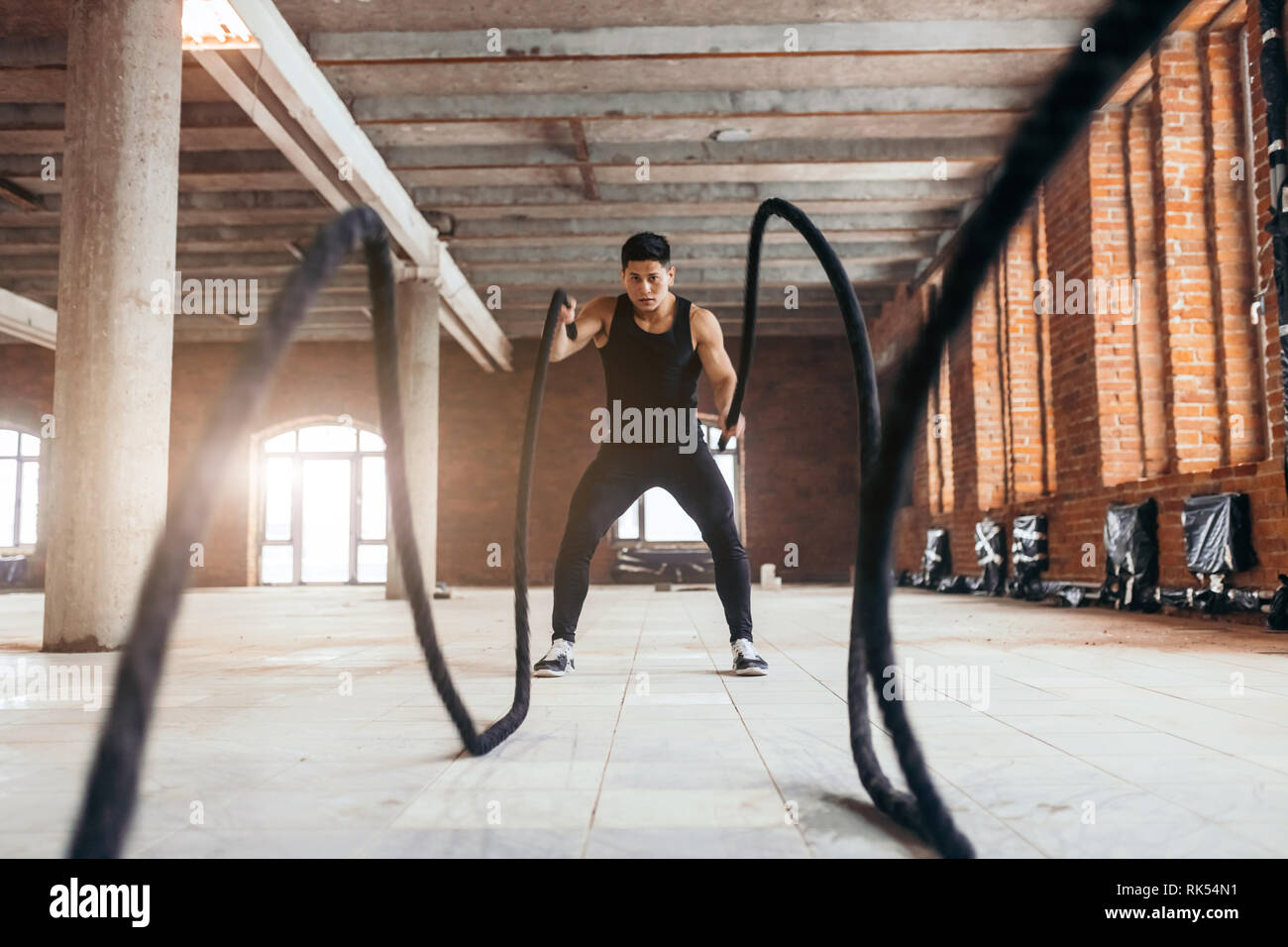 havy rope training. rope movement. core strength and stability. guy ...