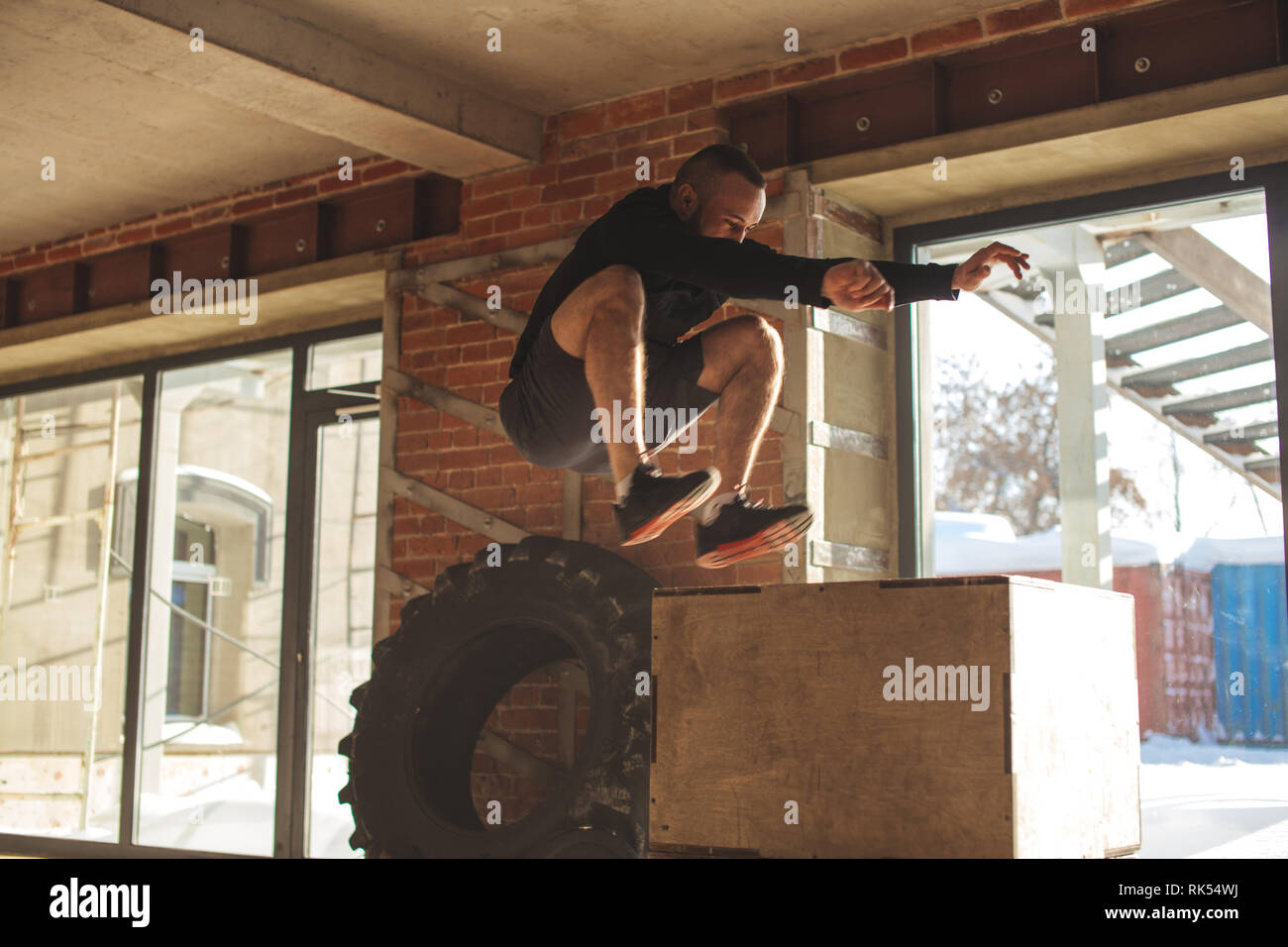 Young male Athlete doing plyo jumps exercise training endurance in ...