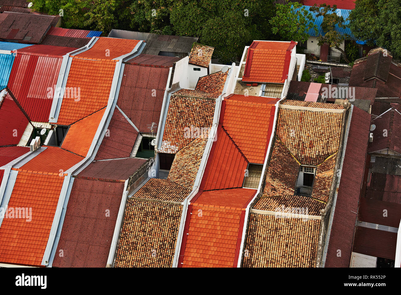 view of the roof and rows of shophouses in the old town from the top of ...
