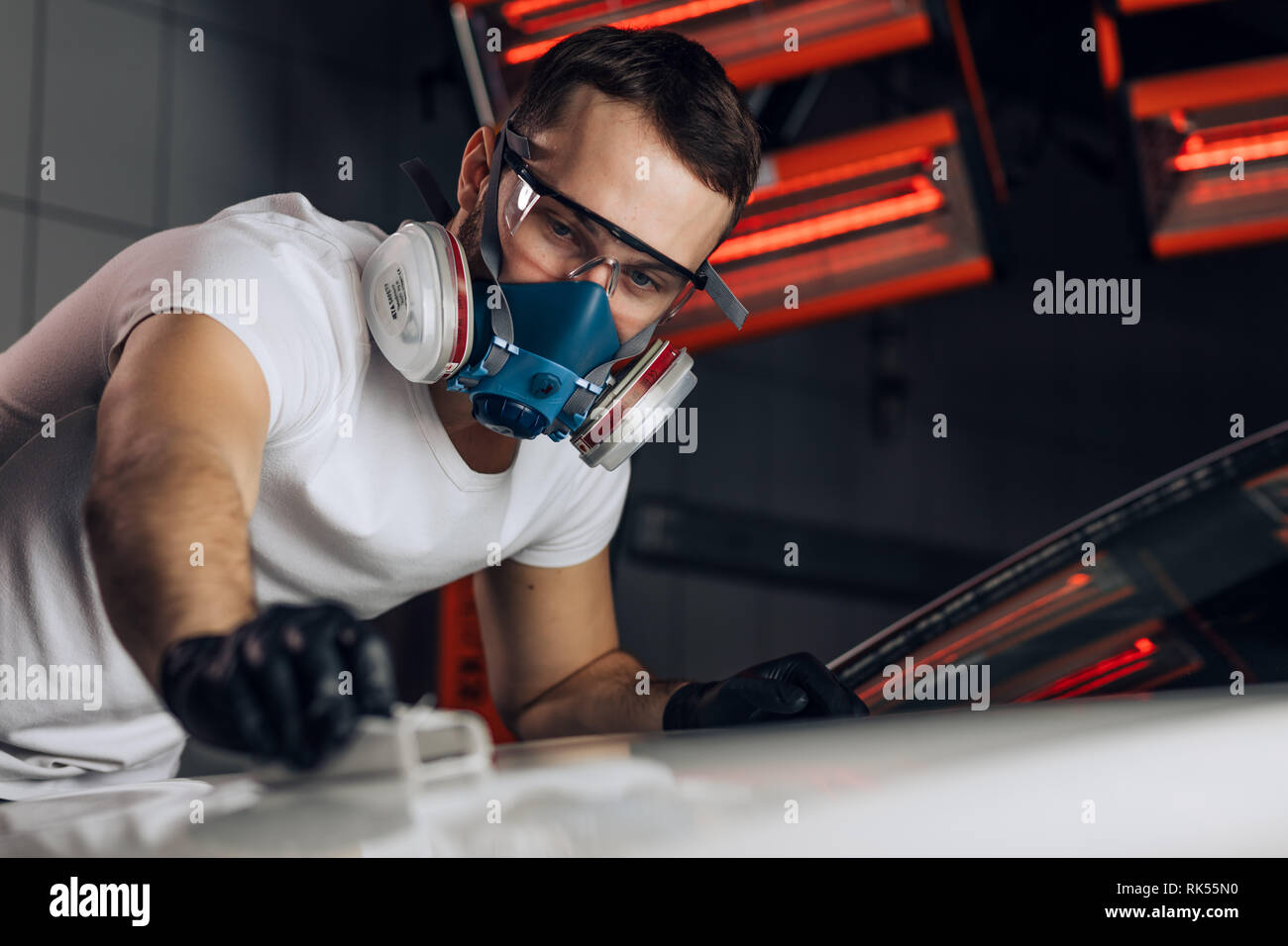 man repairing a car after the accident.close up photo. copy space Stock ...