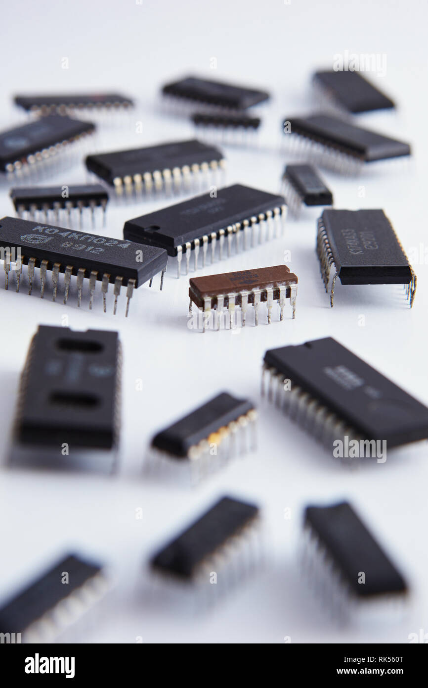 Electronic chip on white background background, pile Stock Photo - Alamy