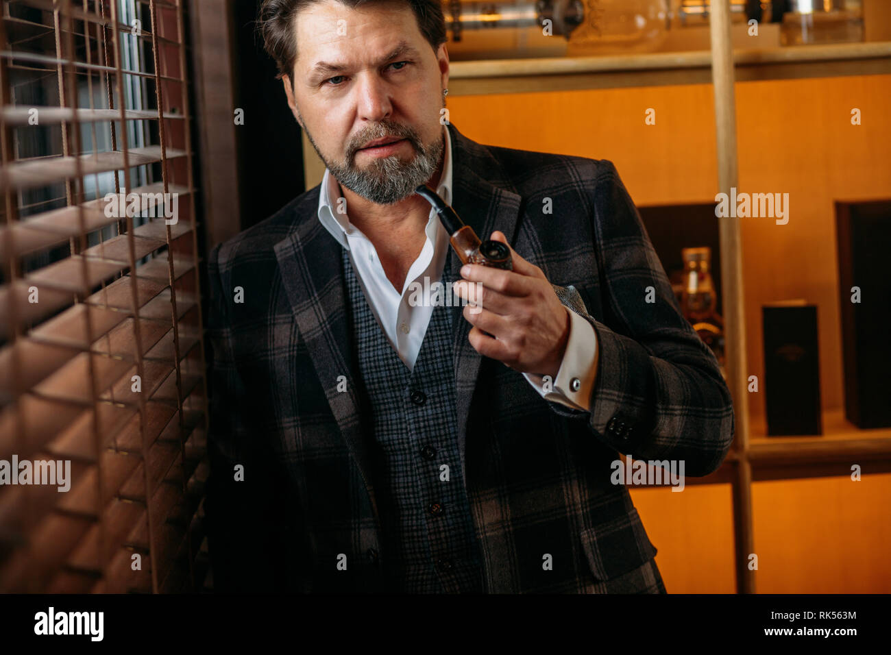 Puffing on pipe hi-res stock photography and images - Alamy