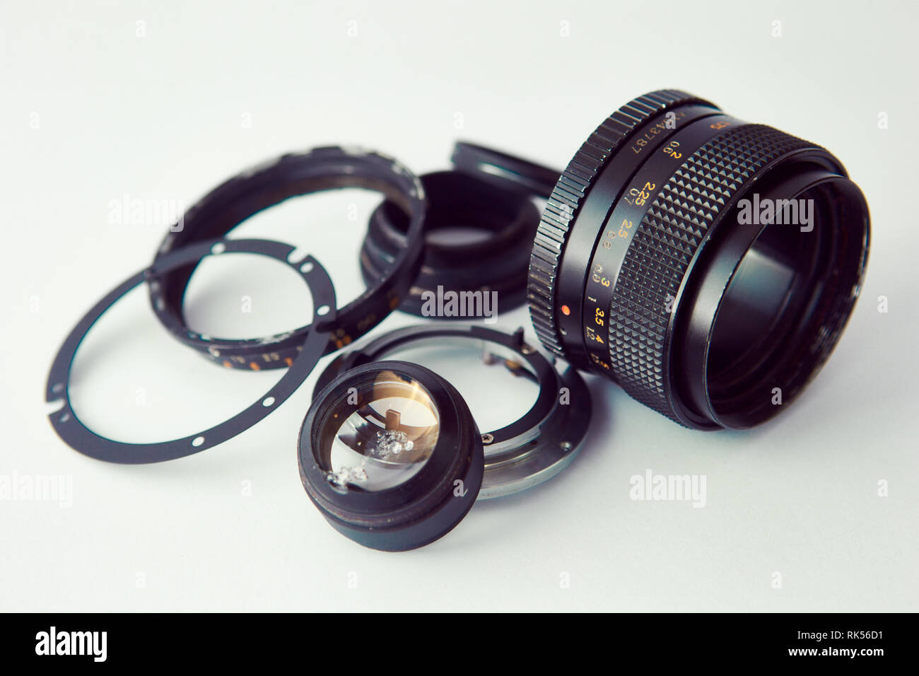 disassembled lens on a white background Stock Photo - Alamy