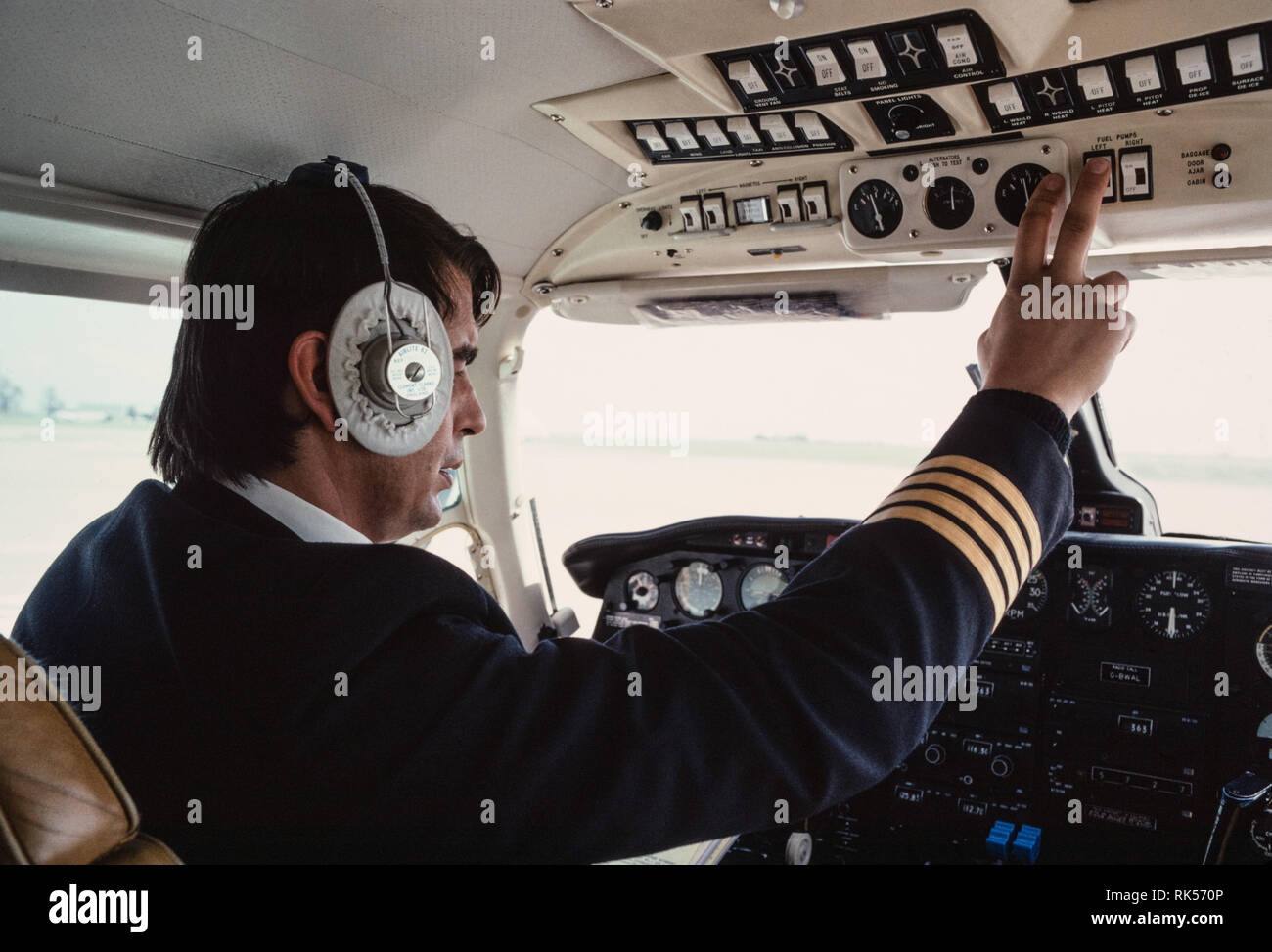 Pilot in Aircraft Cockpit Stock Photo - Alamy