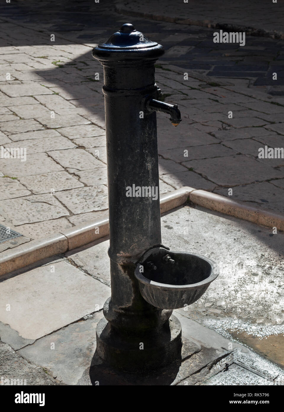 Drinkable water in public water tank Stock Photo - Alamy