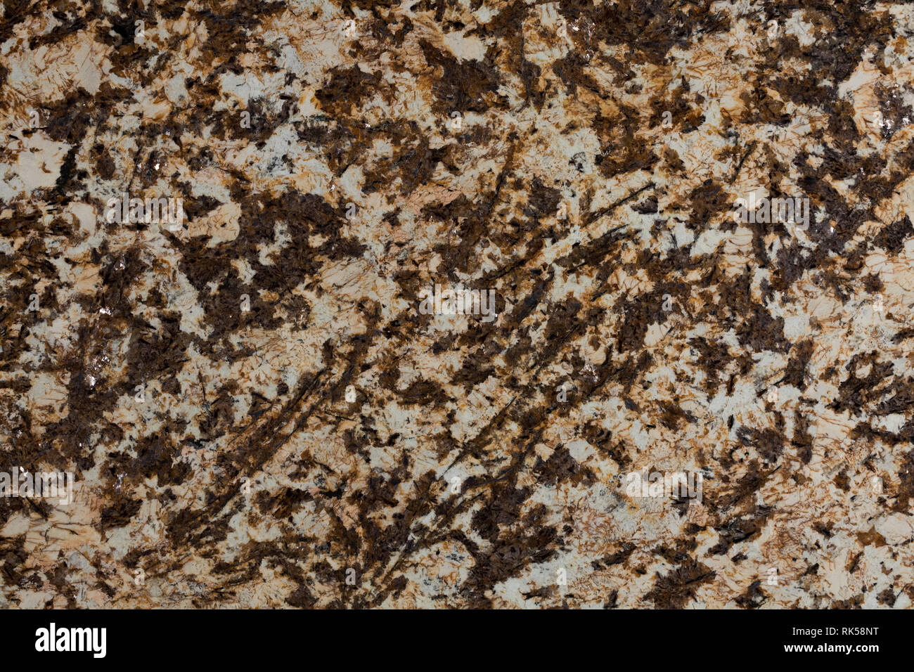 Stone background of mottled brown granite igneous rock Stock Photo - Alamy