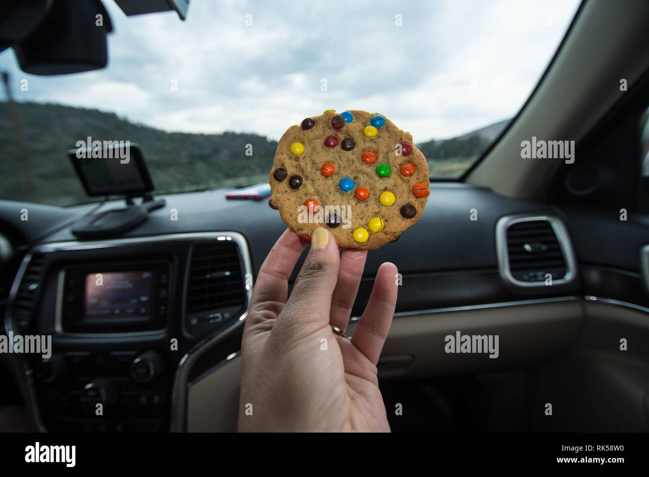 AUGUST 4 2016 - LOS ANGELES, CALIFORNIA: A hand holds up a colorful ...