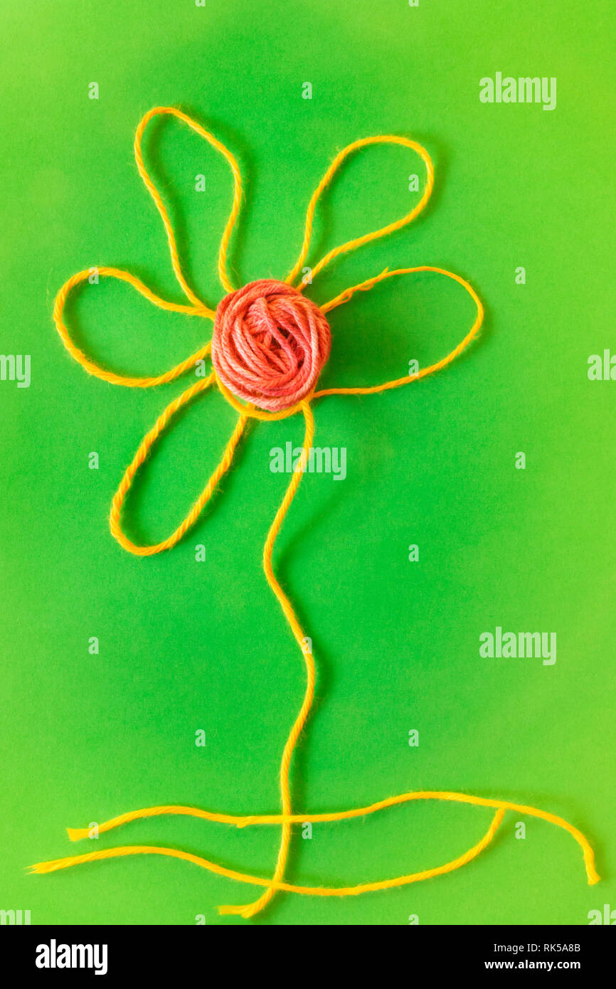 Funny flower made using thread , symplicity and stylization to create a ...