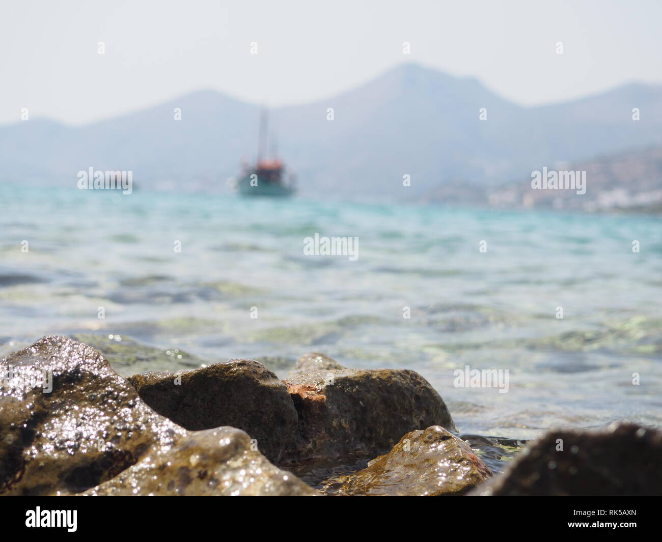 a ship on the horizon, a ship at sea far away Stock Photo - Alamy
