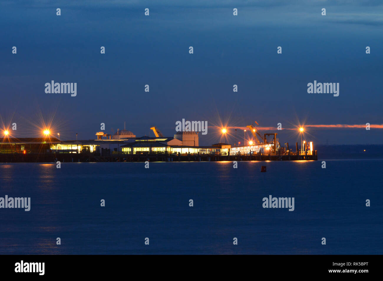 Ryde Pier Head on the Isle of Wight photographed during blue hour, just ...