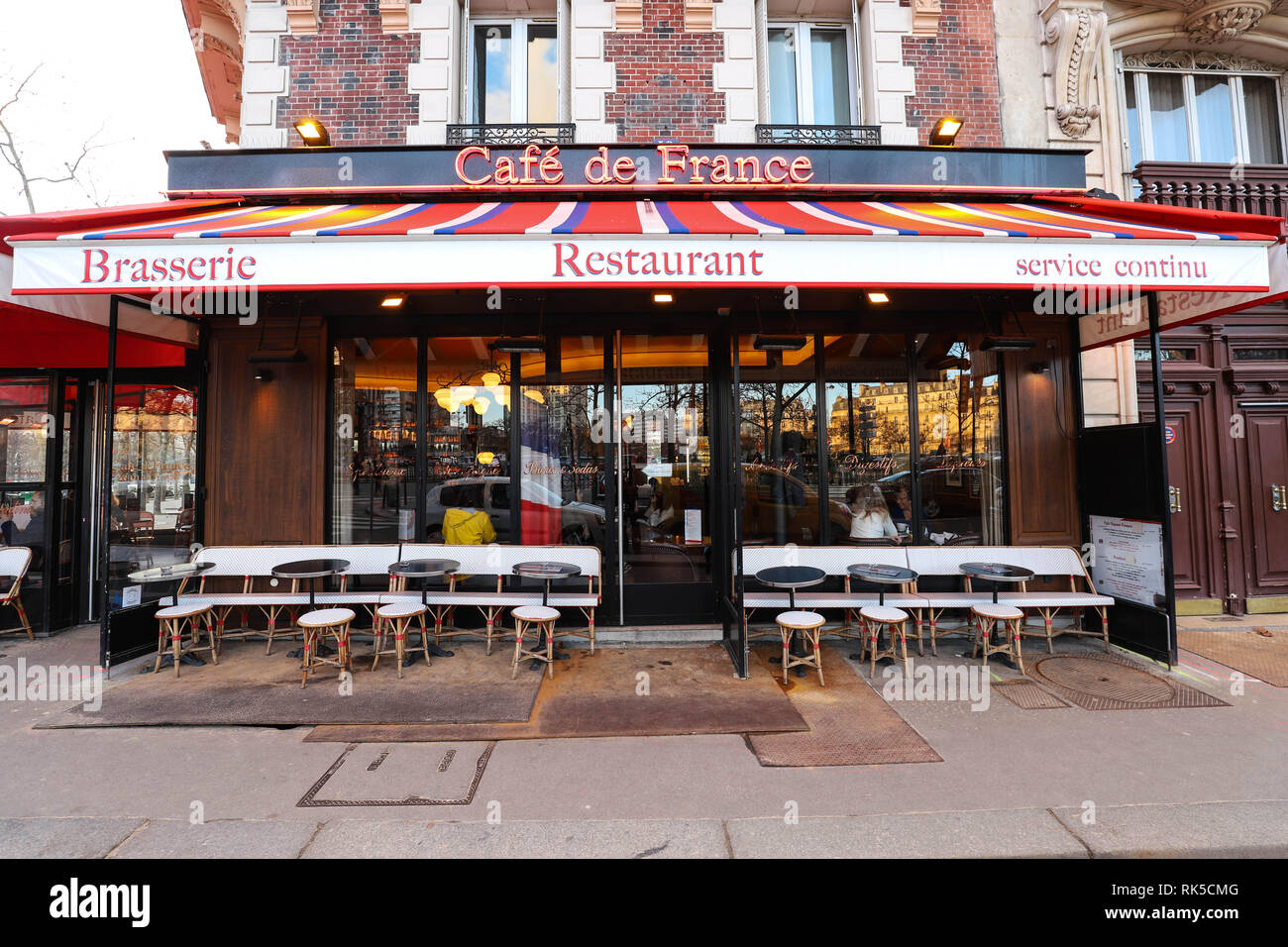 Typical view of the Parisian street cafe de France located near Italy ...