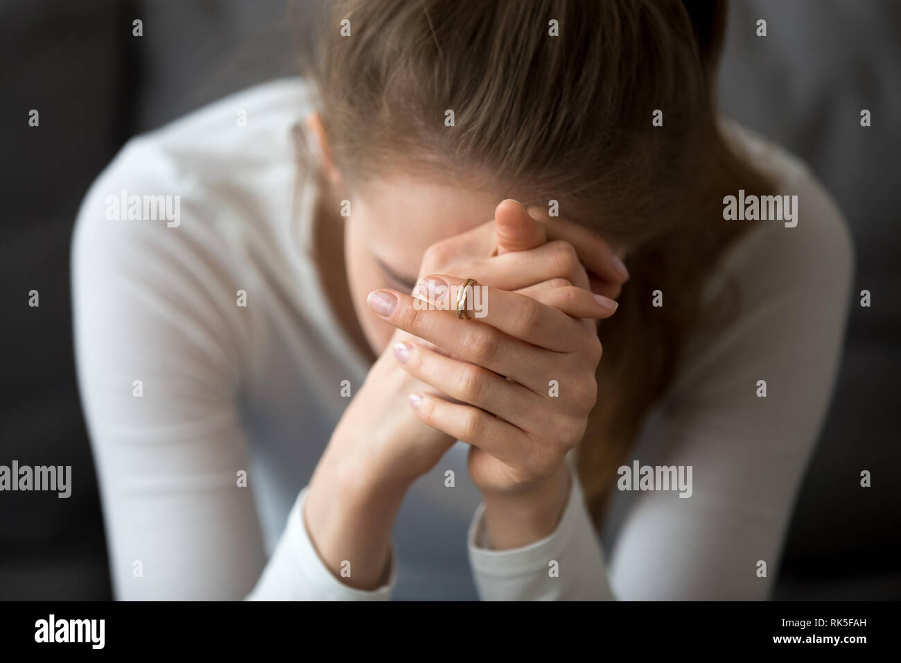 Sad woman feeling hopeless crying alone, girl in despair concept Stock ...