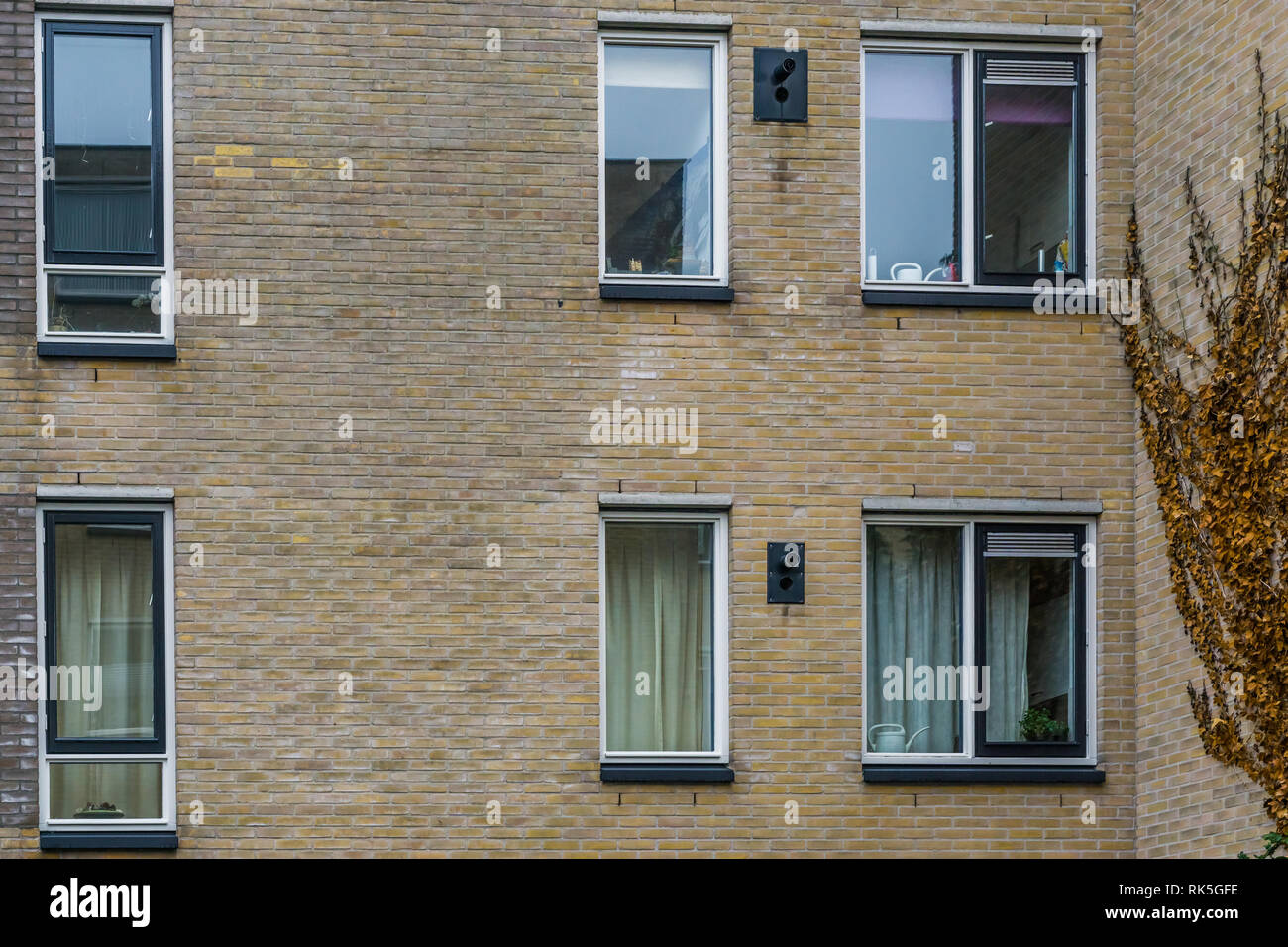 Modern dutch city architecture, Windows in a brick wall, architectural ...