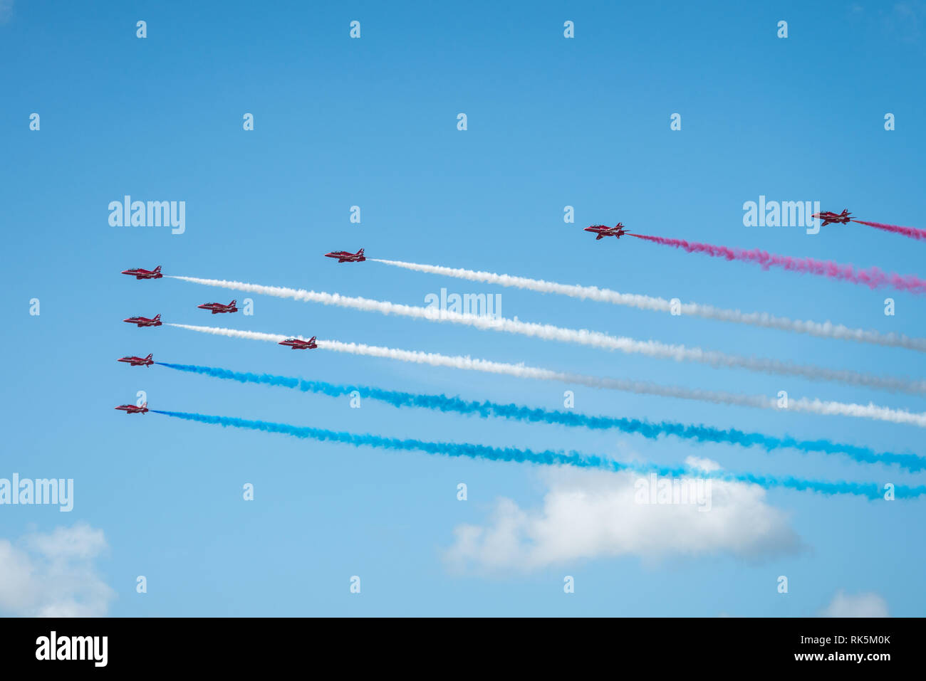 The Royal Air Force Red Arrows aeroplanes release smoke as they perform ...
