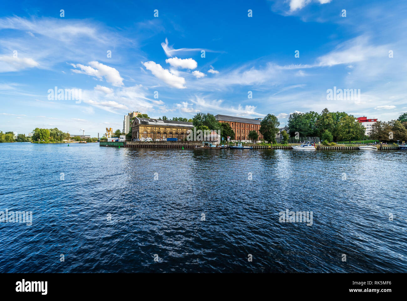 BERLIN - SEPTEMBER 09, 2018: Industrial buildings on the banks of the ...