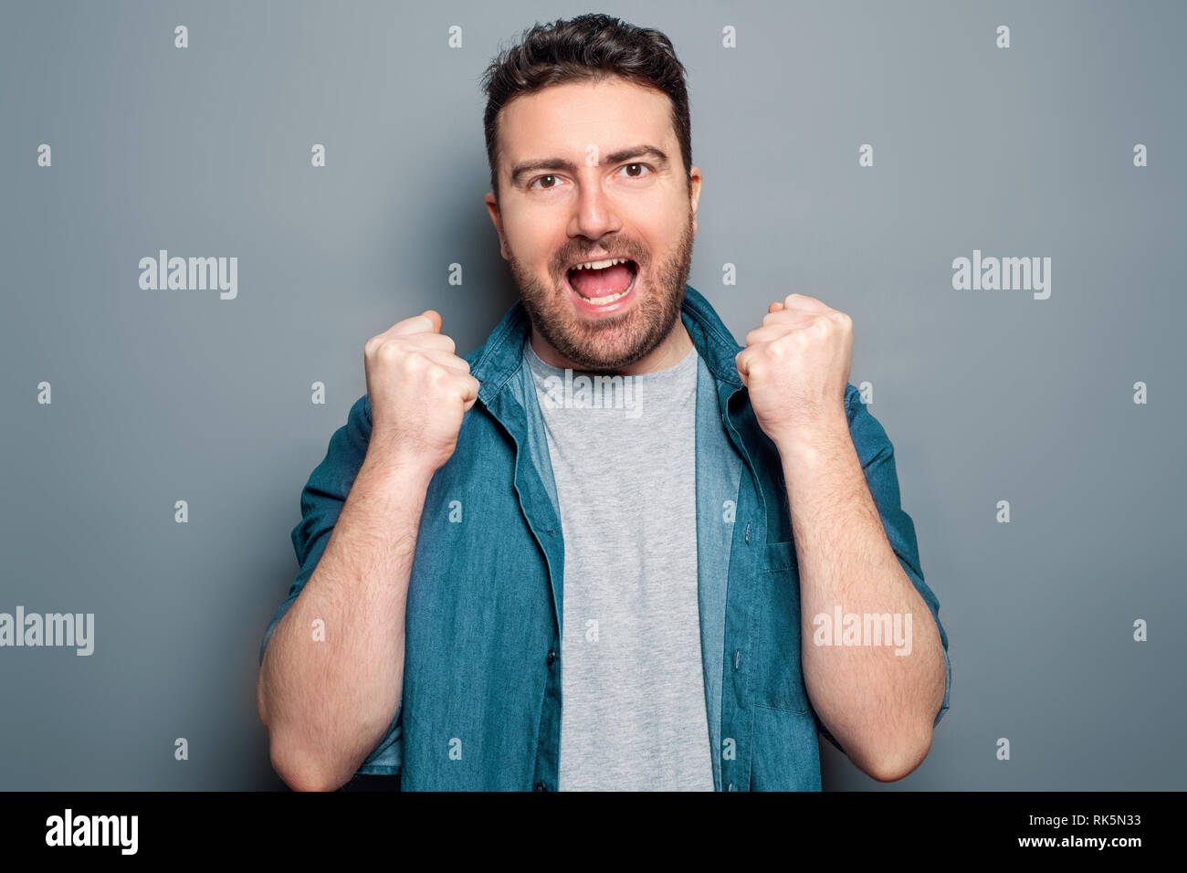 Cheering Pose High Resolution Stock Photography and Images - Alamy