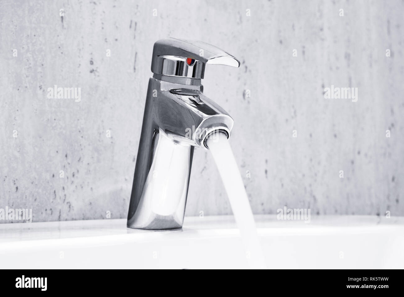 faucet and water flow Stock Photo - Alamy