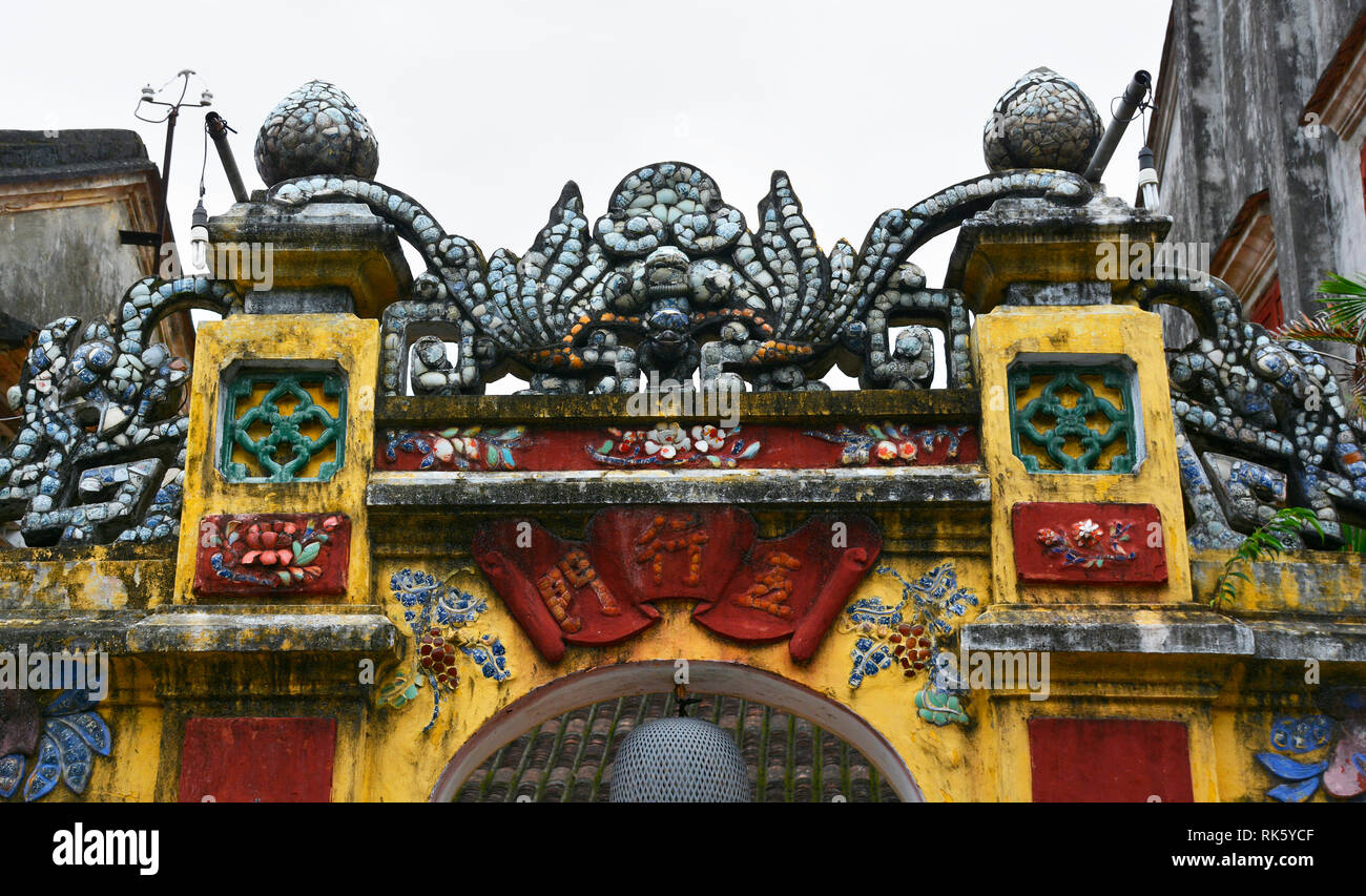 An old historic ornate traditional gateway to a courtyard in the UNESCO ...