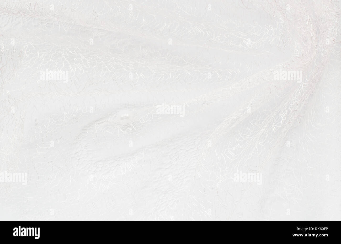 Closeup of white folded fabric for background Stock Photo - Alamy